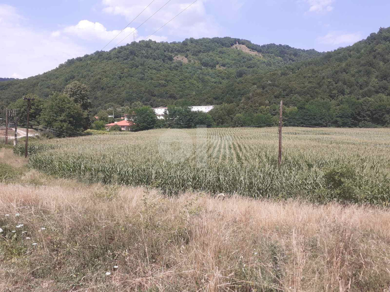 PRODAJEM 20 DUL.ZEMLJE PORED ASFALTA I RIJEKE. - Zemljišta - OLX.ba