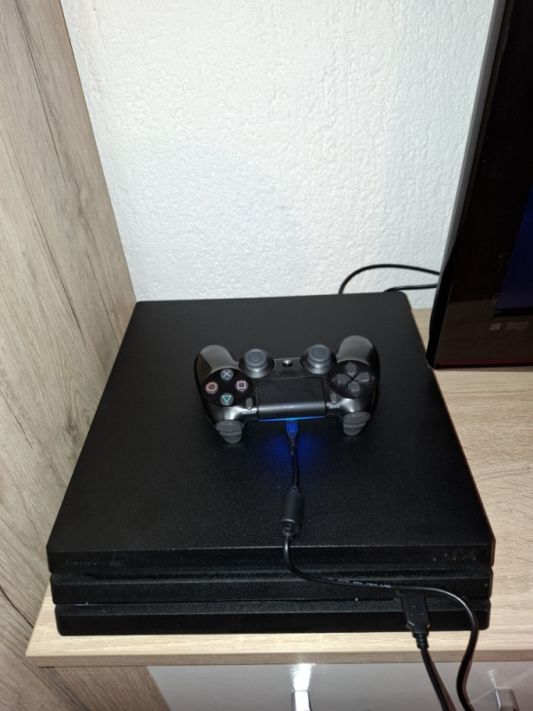 Ps4 pro 1tb 12 igri - Konzole - OLX.ba